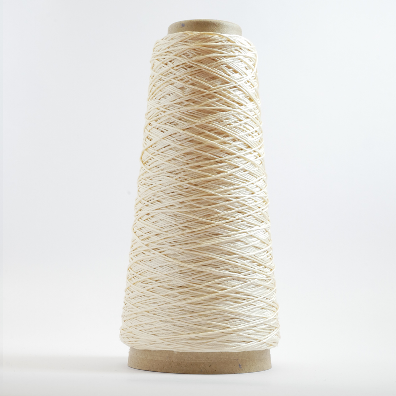 Silk Como Yarn on cones for machine knitting, from a top Italian ...